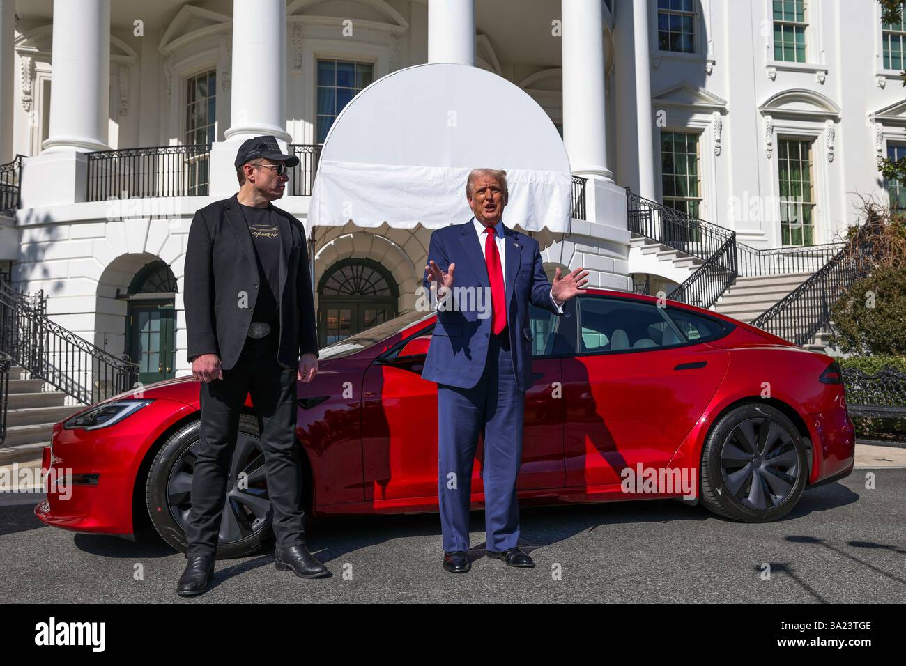 President Donald Trump and Tesla CEO Elon Musk speak to reporters in ...