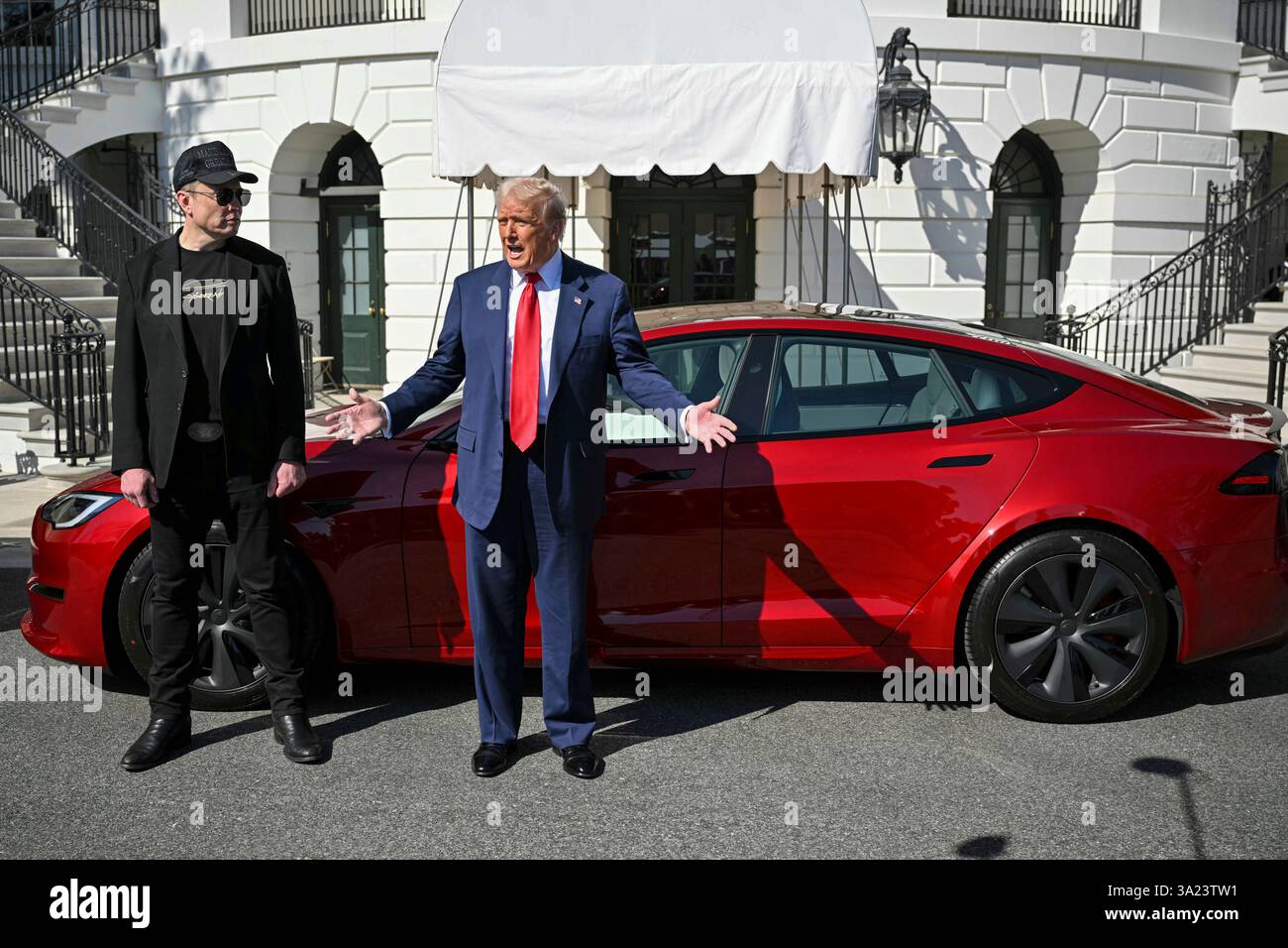 President Donald Trump and Tesla CEO Elon Musk speak to reporters near ...