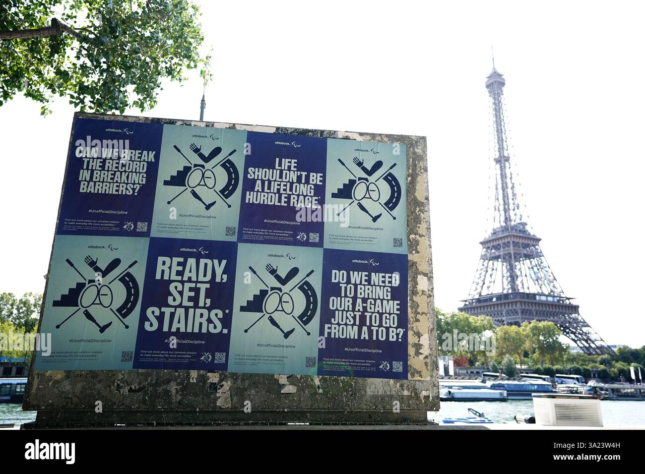 A billboard promoting accessibility for disability athletes next to the ...