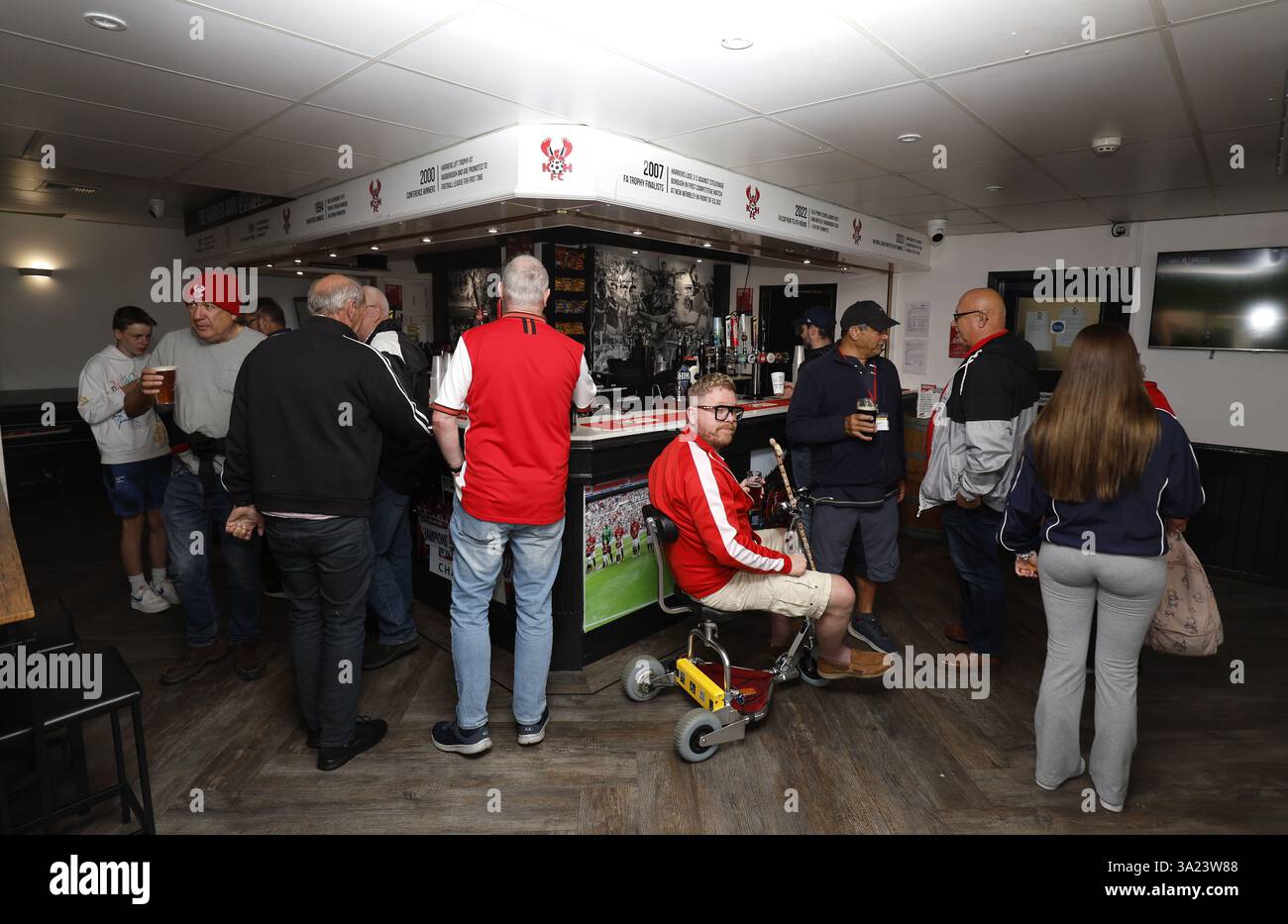 A general view from inside the Harriers Arms with fans inside before ...
