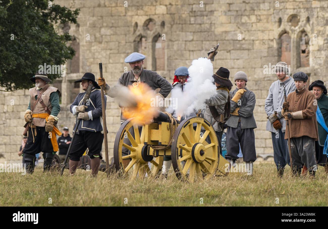 Re-enactors during an artillery display at an English Civil War Society ...