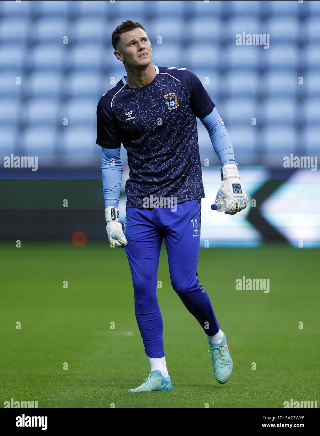 Coventry City goalkeeper Ben Wilson warms up before the Carabao Cup ...