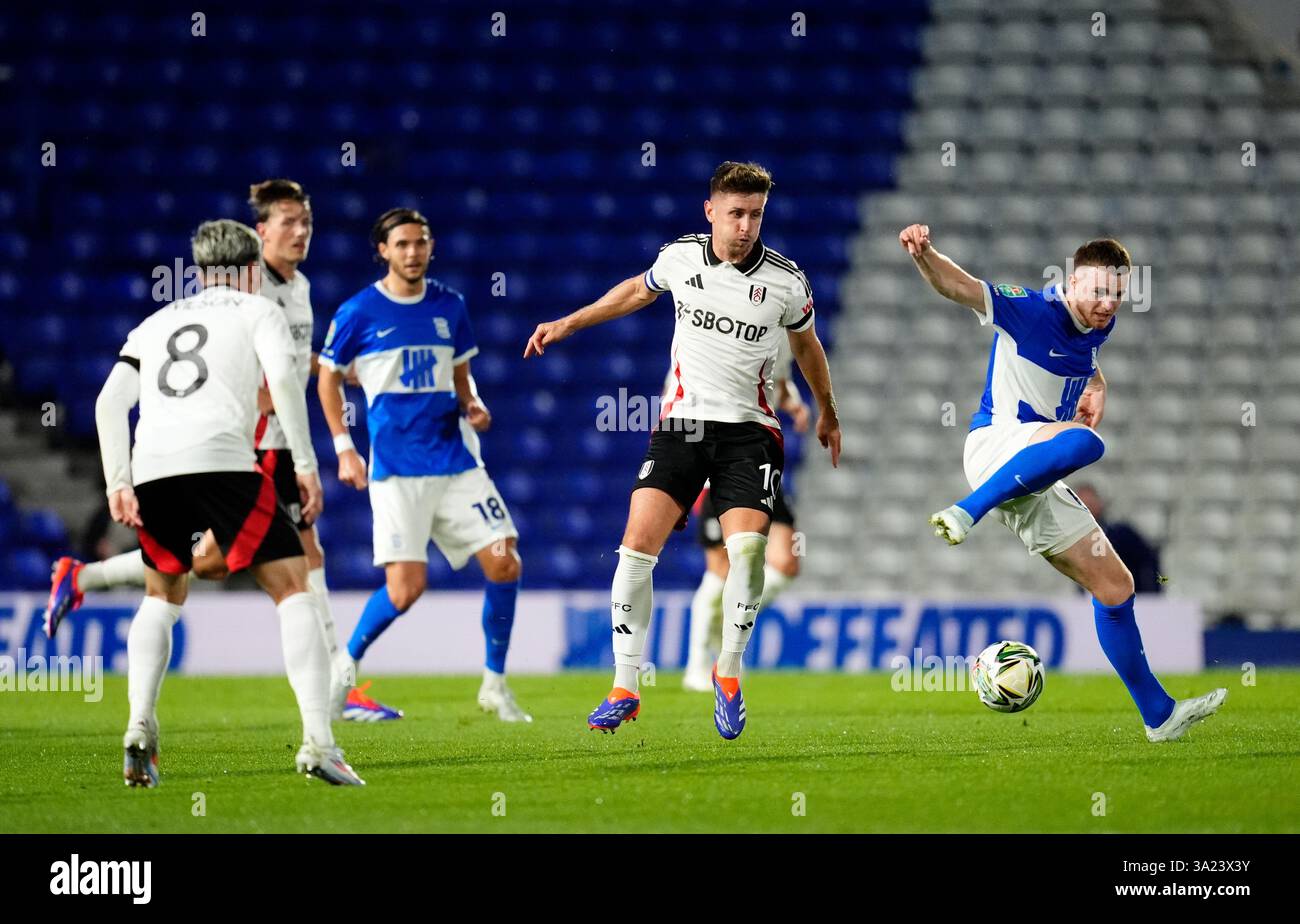 Fulham's Tom Cairney (second right) and Birmingham City's Marc Leonard ...