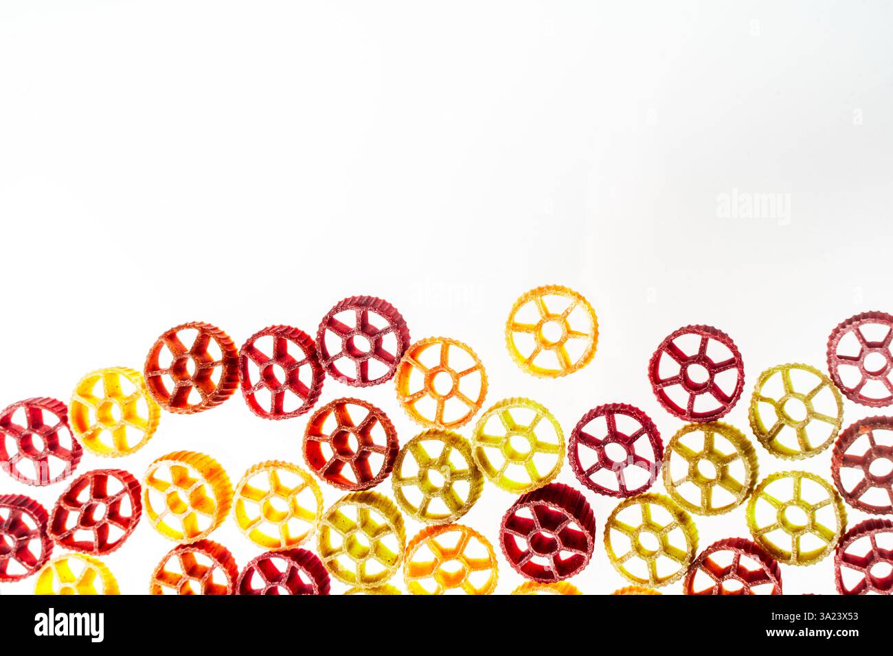 Dry Italian pasta Rotelle on white background in the form of a frame ...