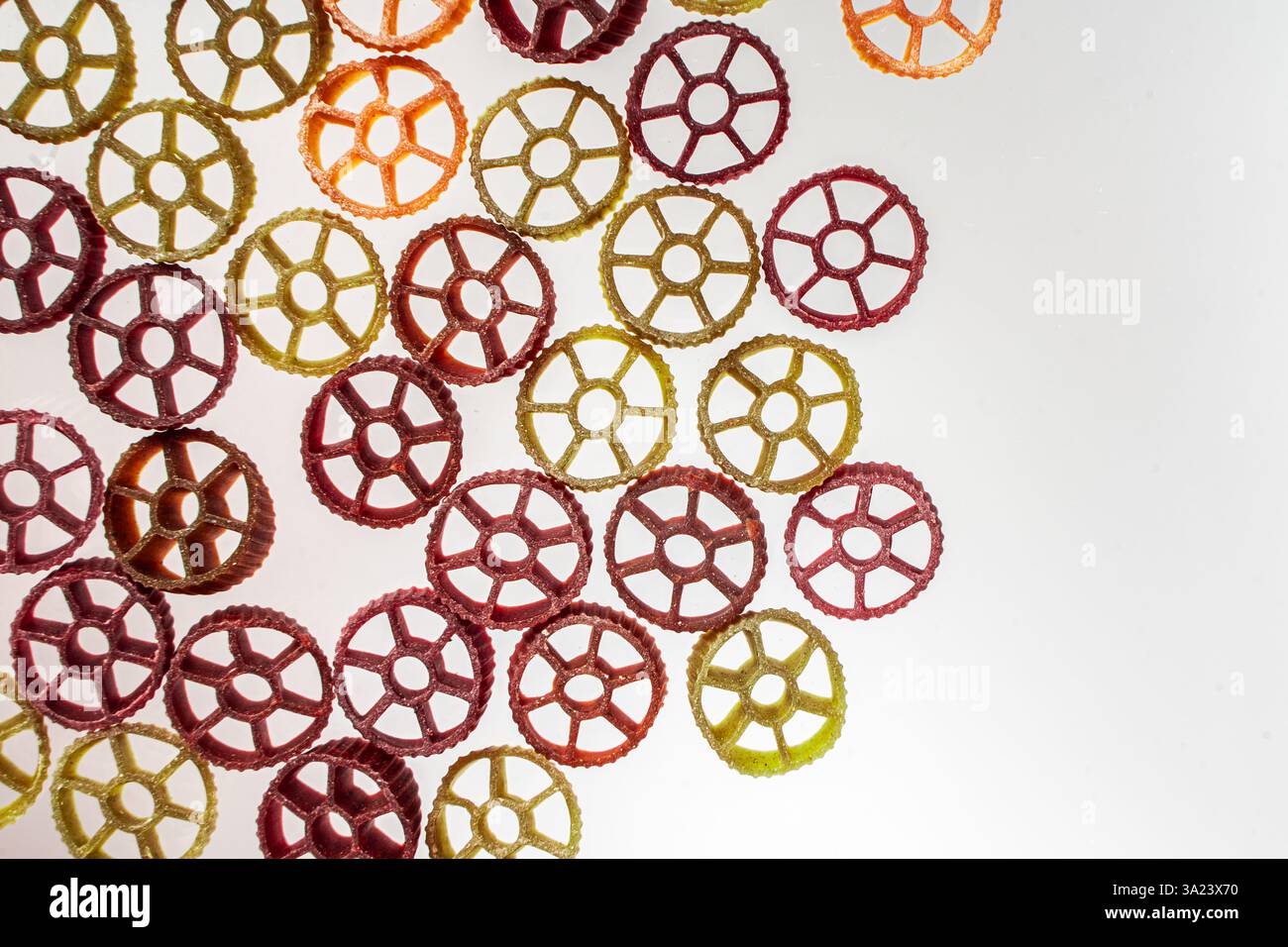 Dry Italian pasta Rotelle on white background in the form of a frame ...