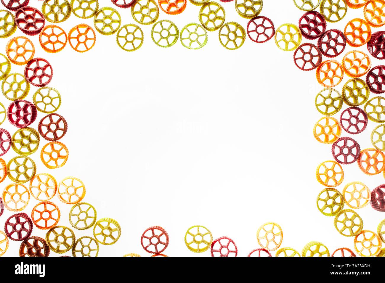 Dry Italian pasta Rotelle on white background in the form of a frame ...