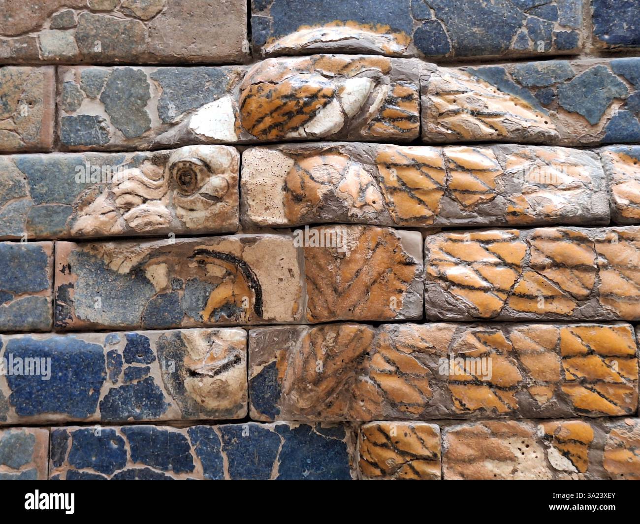Close up of the mosaic of a lion head with a mighty mane on blue ...