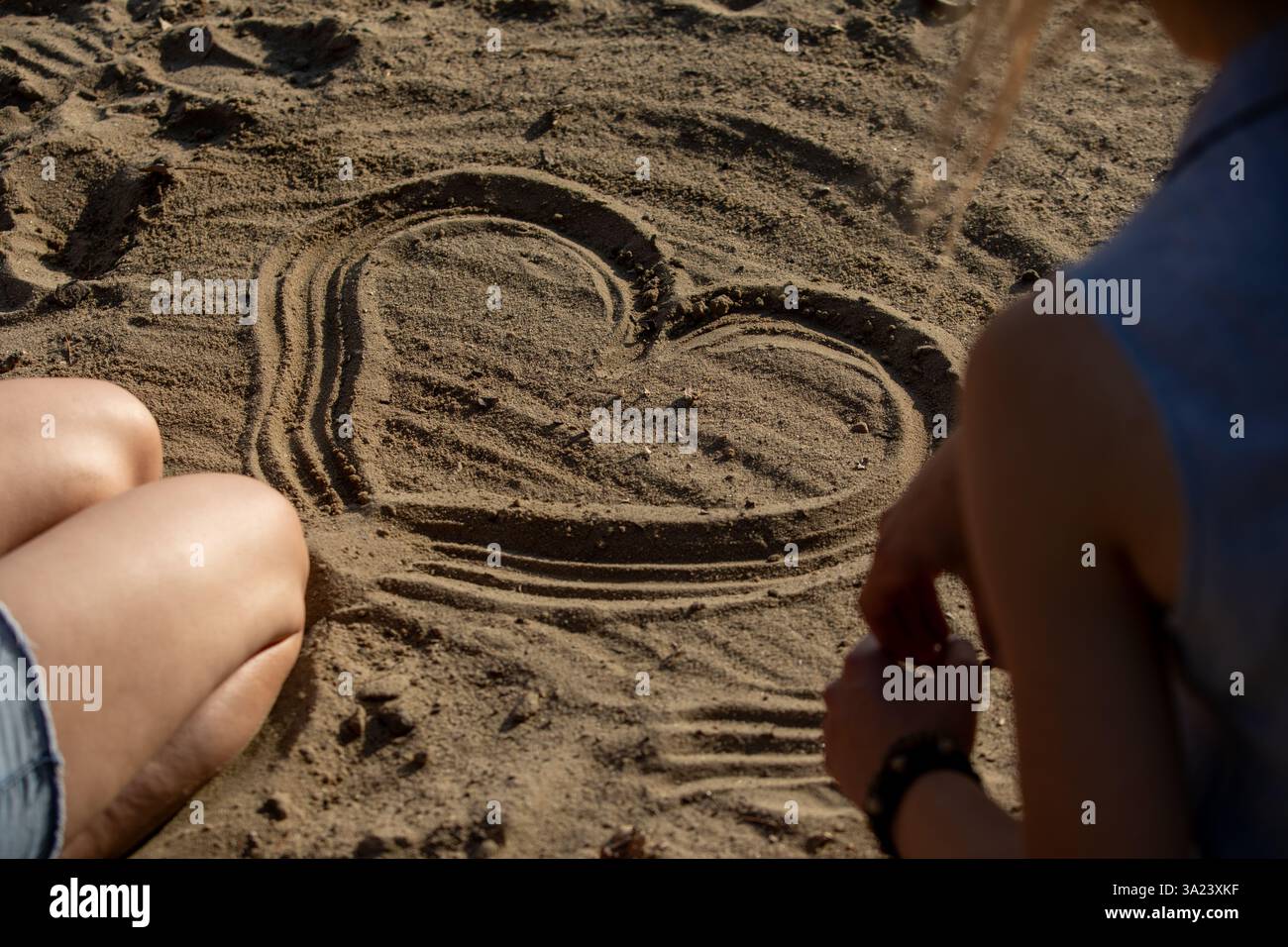 A Heart Drawing in the Sand An Endearing Moment of Love, Joy, and ...