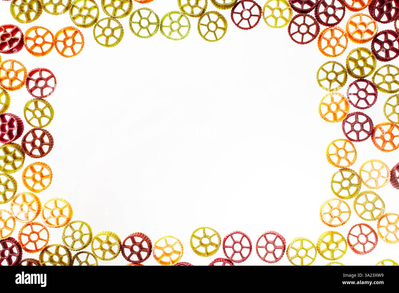 Dry Italian pasta Rotelle on white background in the form of a frame ...