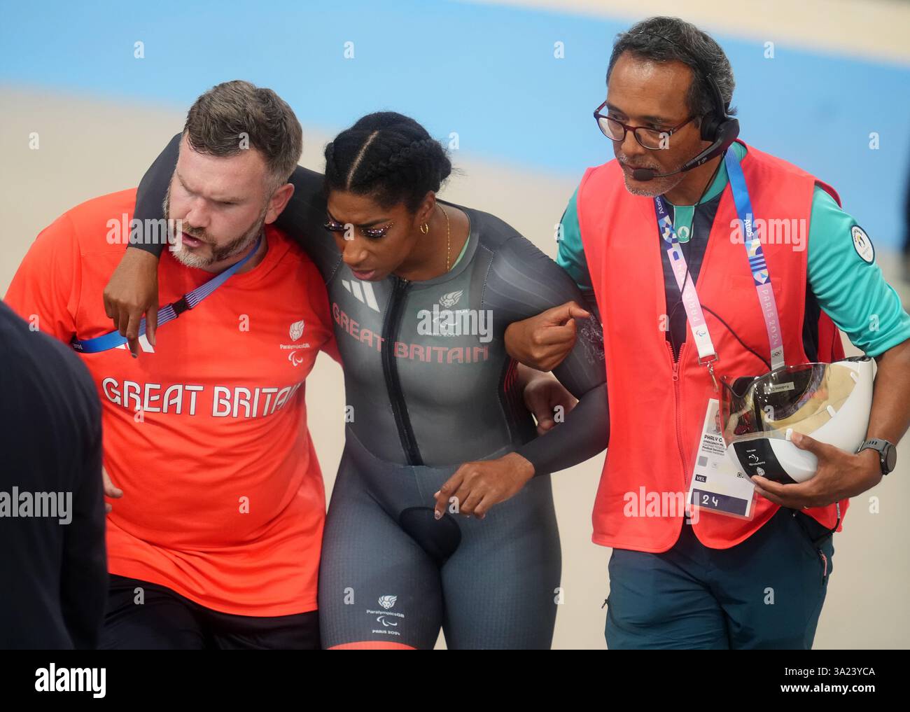 Great Britain's Kadeena Cox is helped after crashing in the Women's C4 ...