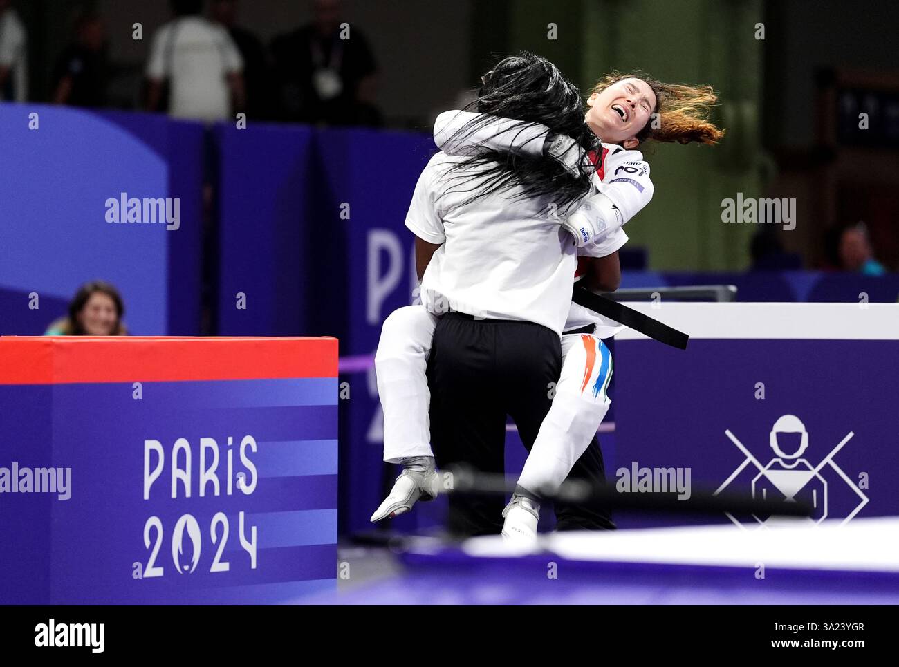 Refugee Paralympic Team's Zakia Khudadadi celebrates victory over ...