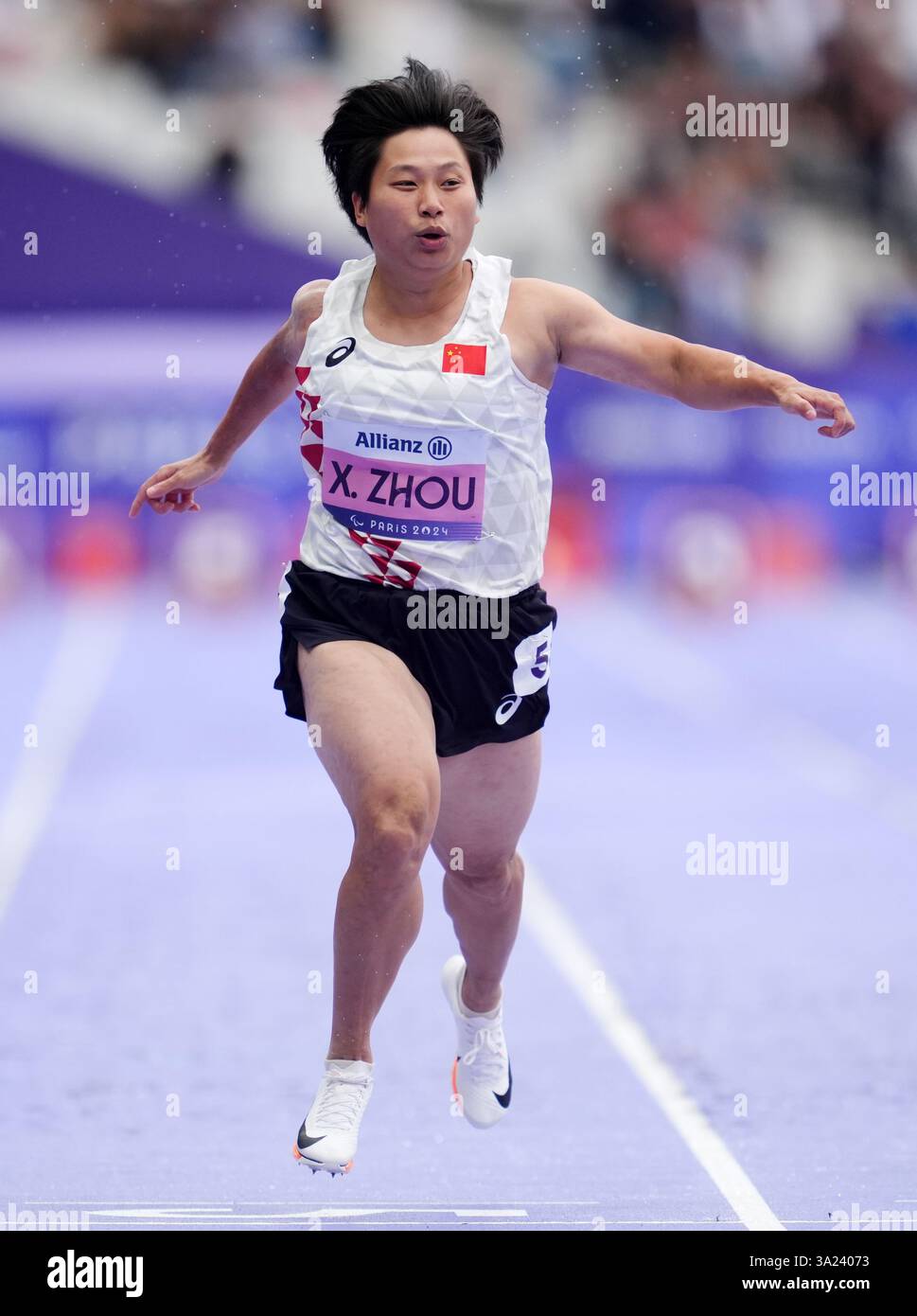 China's Xia Zhou wins the Women's 100m - T35 Final at the Stade de ...