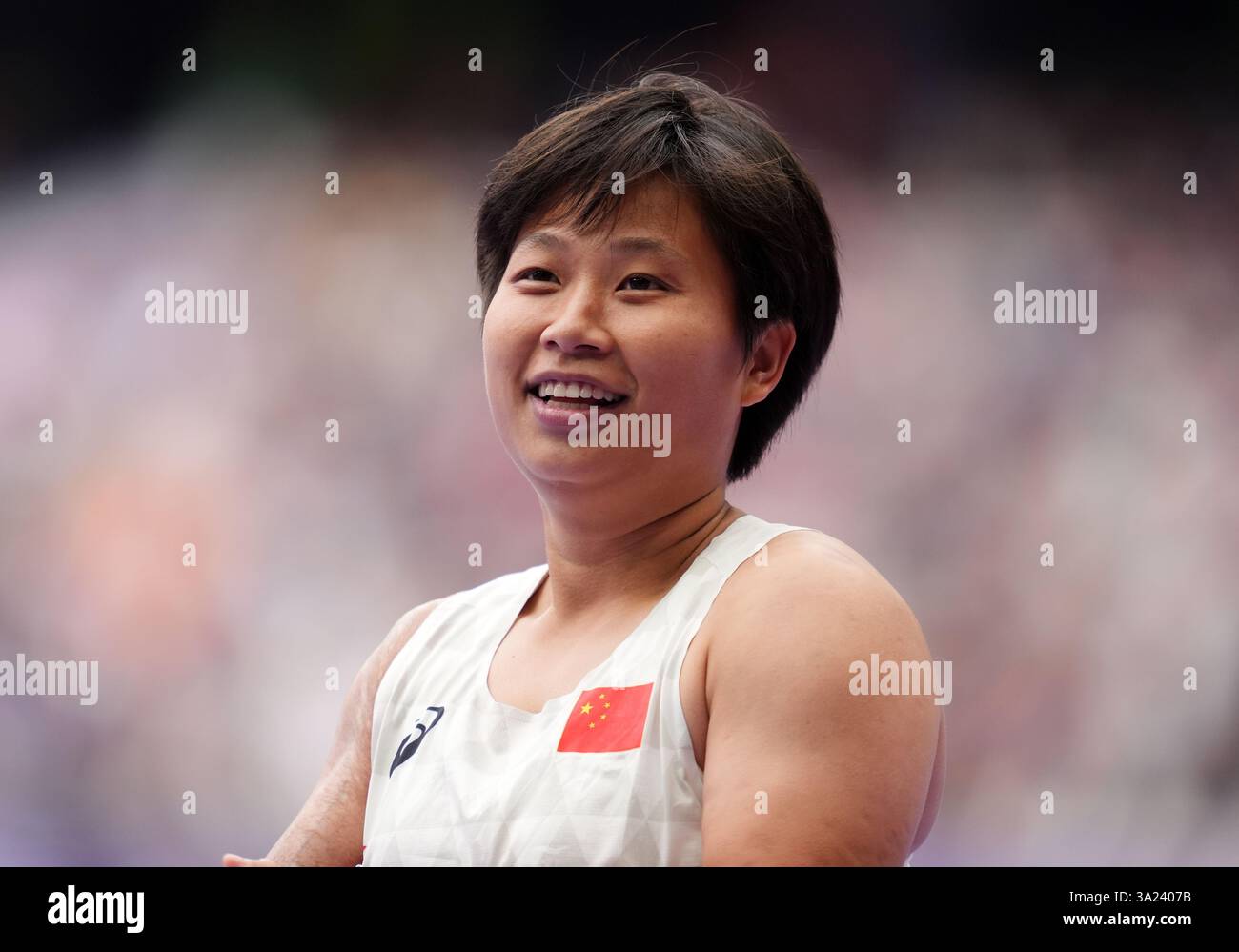China's Xia Zhou celebrates winning the Women's 100m - T35 Final at the ...