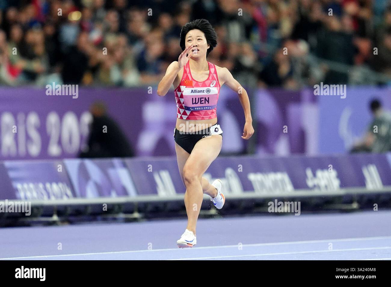 China's Xiaoyan Wen wins gold in the Women's 200m T37 Final at the ...
