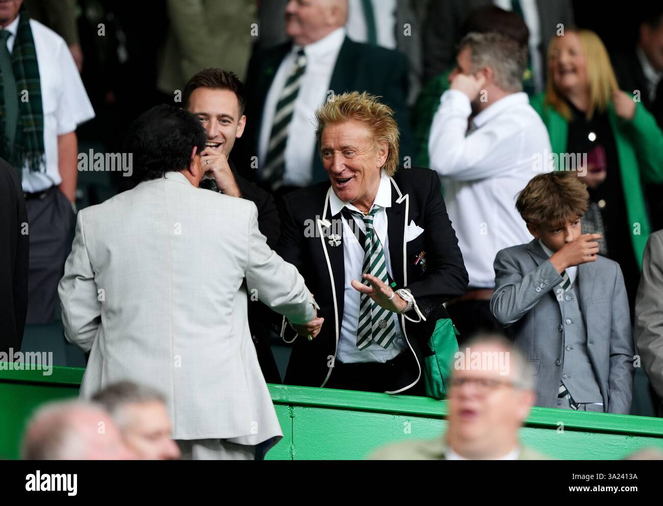 Rod Stewart (centre) in the stands before kick off at the William Hill ...
