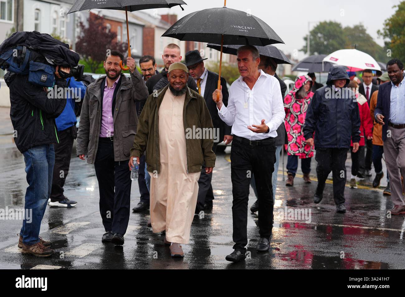 People of multiple faiths join together in a Walk of Faith from the ...