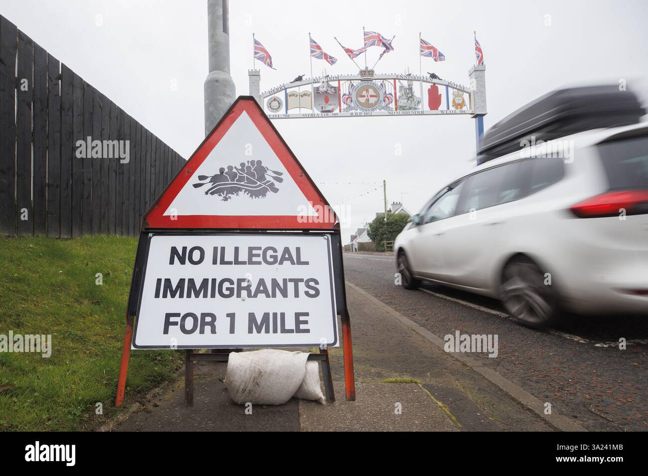 Road sign with image of people a dingy boat with the message, "No ...