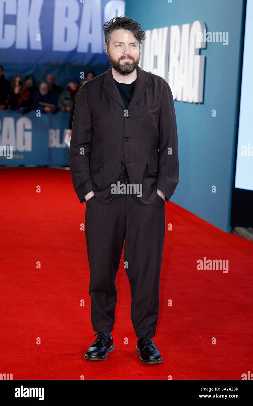 Tom Burke poses for photographers upon arrival at the premiere of the ...
