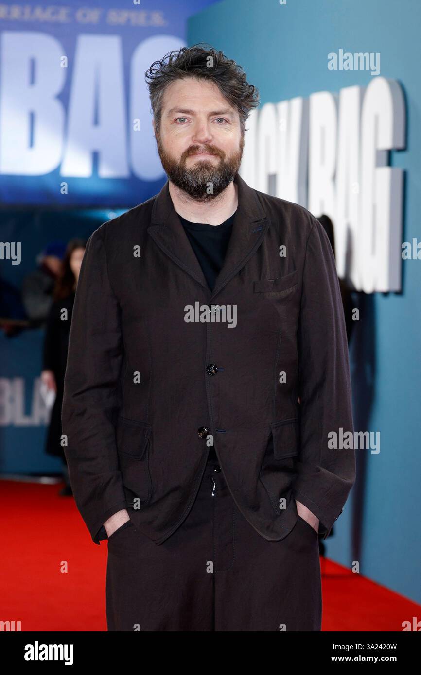 Tom Burke poses for photographers upon arrival at the premiere of the ...