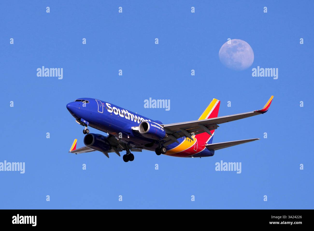 A Southwest Airlines jet lands at St. Louis Lambert International ...