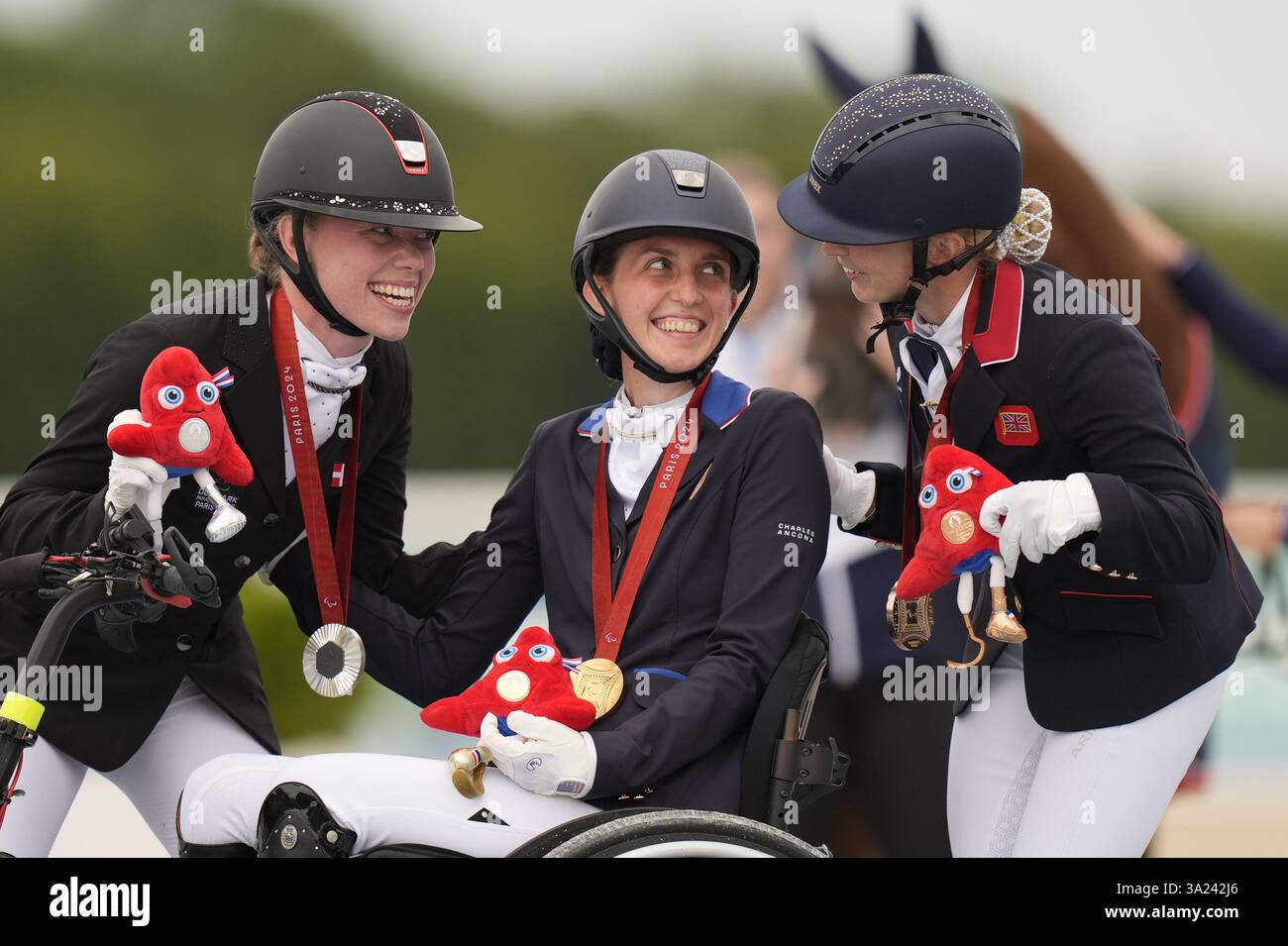 (Left to right) Denmark's Katrine Kristensen, USA's Fiona Howard and ...
