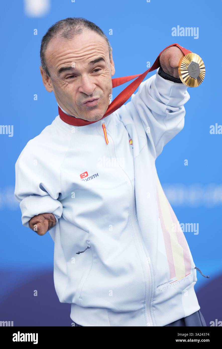 Spain's Ricardo Ten Argiles with his gold medal on the podium following ...