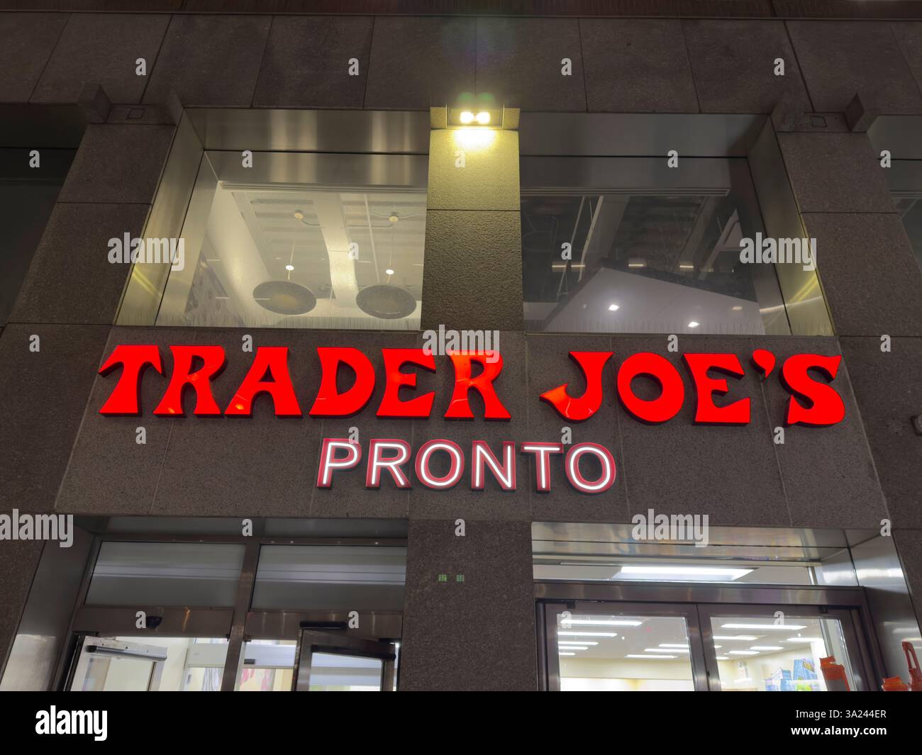 Trader Joe's Pronto, building exterior with company sign at night, New ...