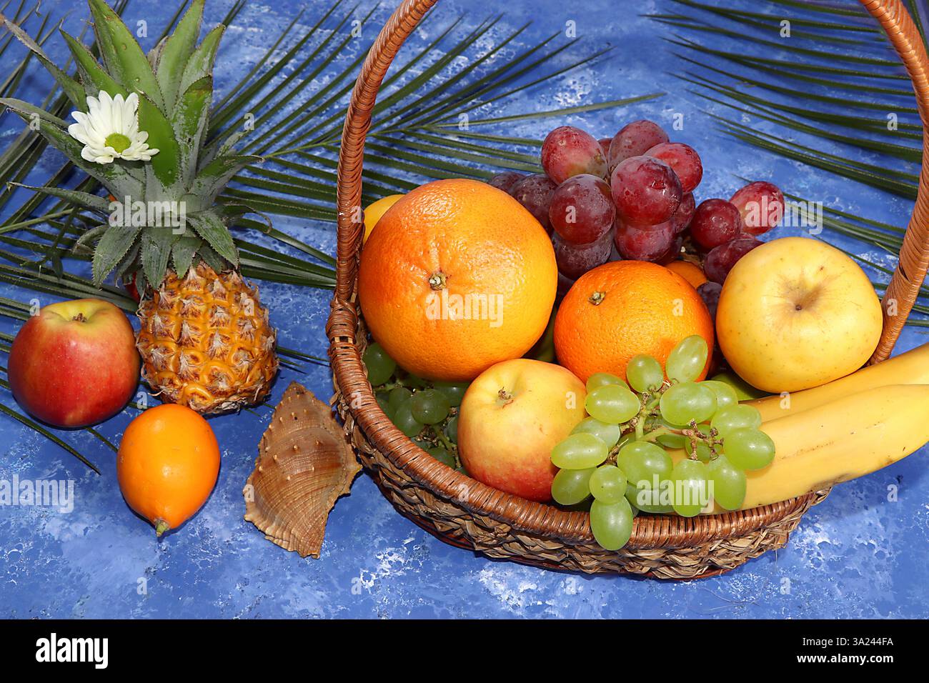 Tropical fruits, pineapple, grapefruit, orange, banana, grapes, lemon ...