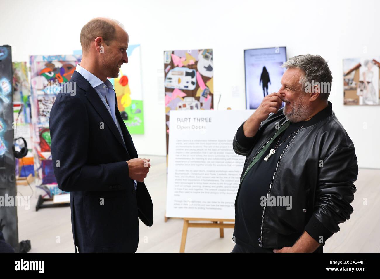 The Prince of Wales (left) speaks with British photographer Rankin ...