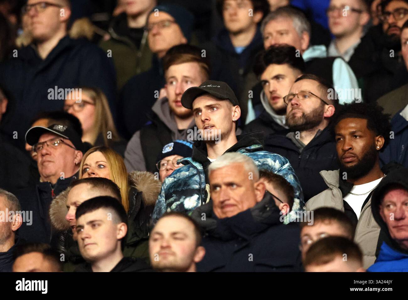 Coventry City's Jack Rudoni (centre) in the crowd with the fans during ...