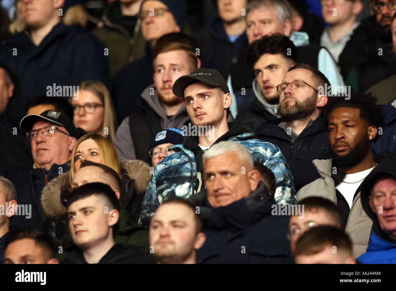 Coventry City's Jack Rudoni (centre) in the crowd with the fans during ...