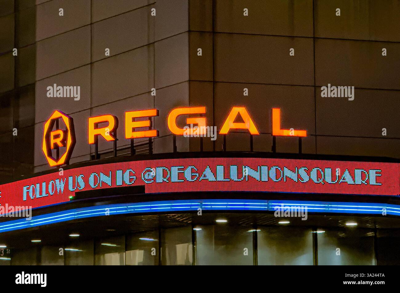 Regal movie theaters, building exterior at night, New York City, New ...