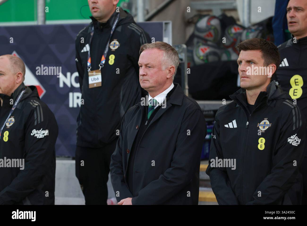 Northern Ireland manager Michael O'Neill and his back-room staff sing ...