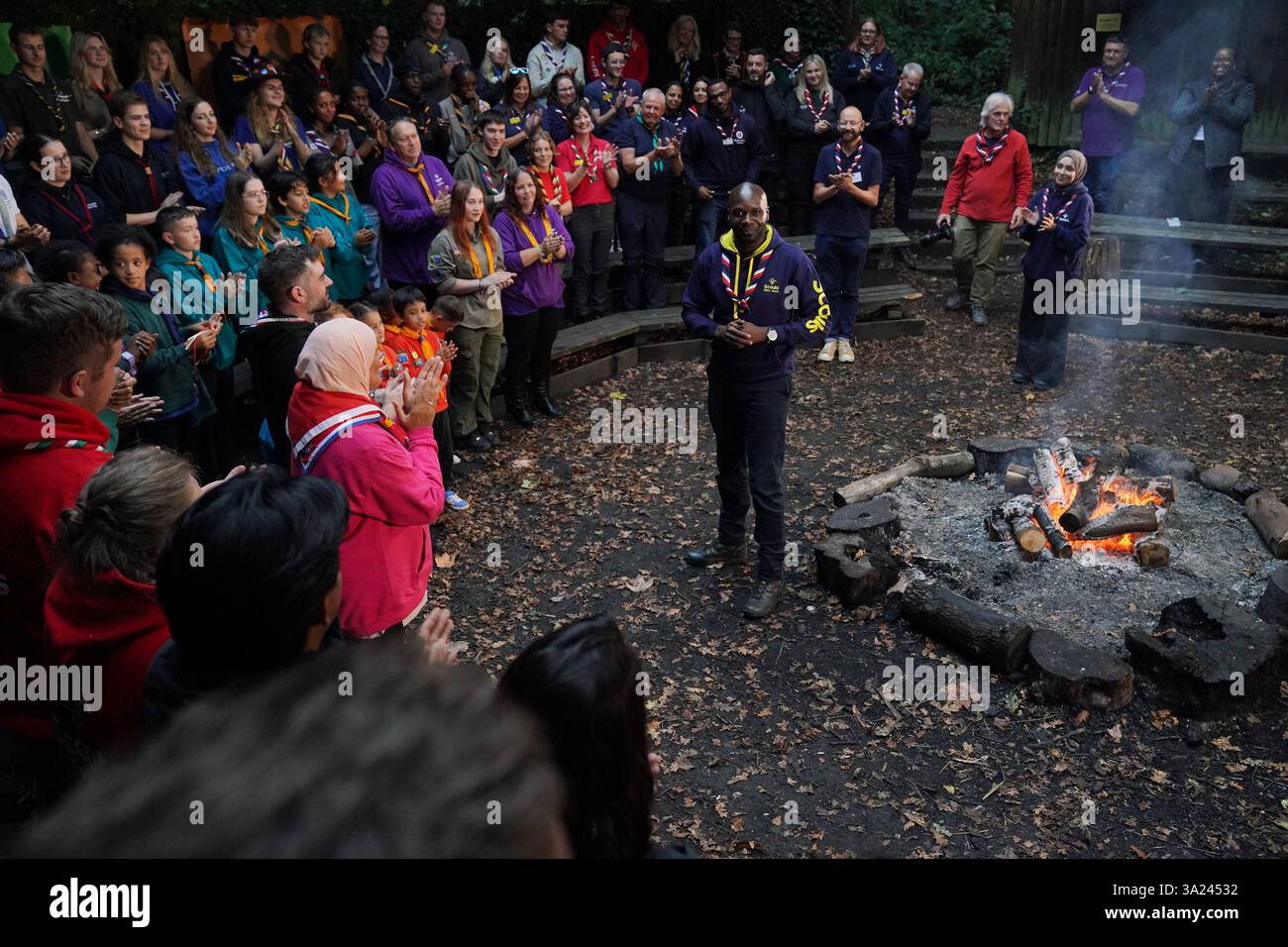 A group of scouts applauds Dwayne Fields, the new Chief Scout, at the ...
