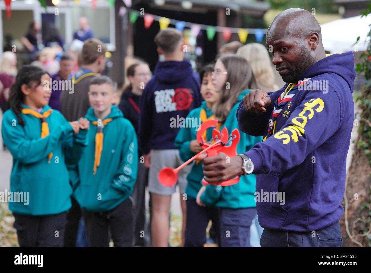 The new Chief Scout, Dwayne Fields, participates in archery at the ...
