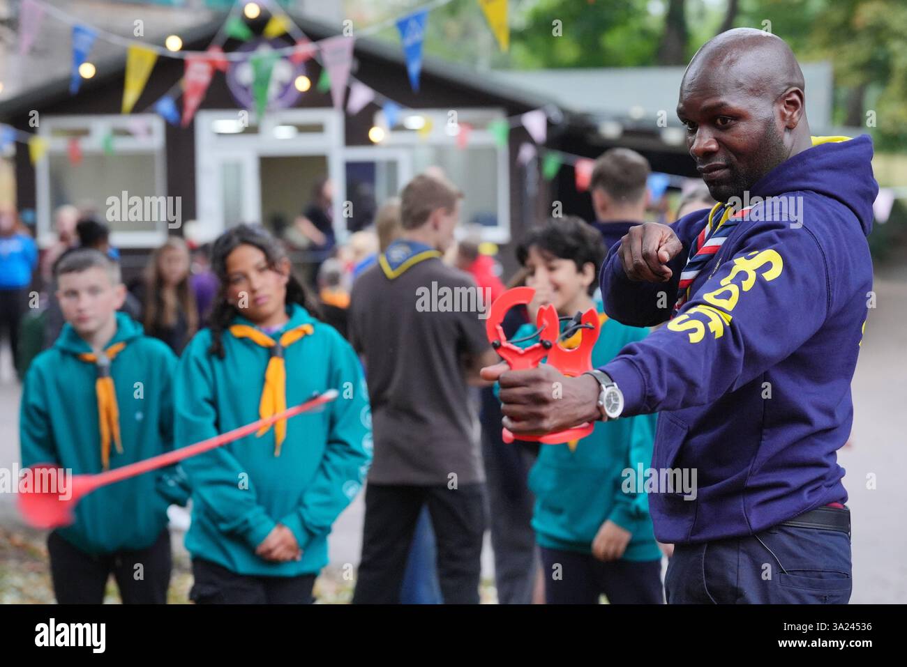 The new Chief Scout, Dwayne Fields, takes part in archery at the scout ...