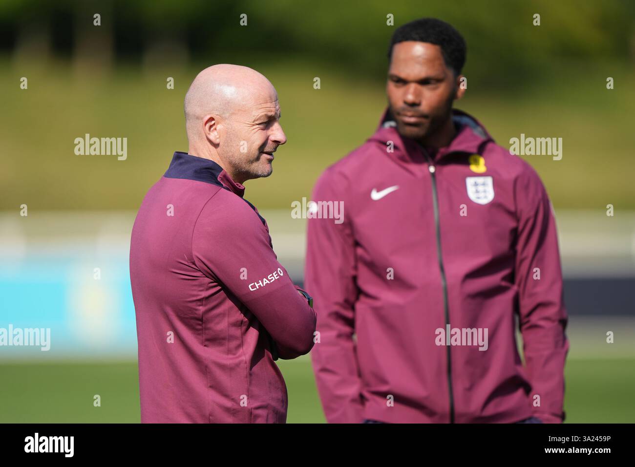 England interim head coach Lee Carsley (left) and coach Joleon Lescott ...