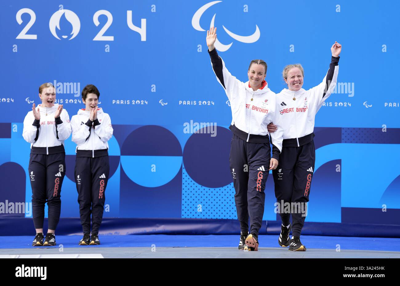 Bronze medallists Great Britain's Lora Fachie and pilot Corrine Hall ...