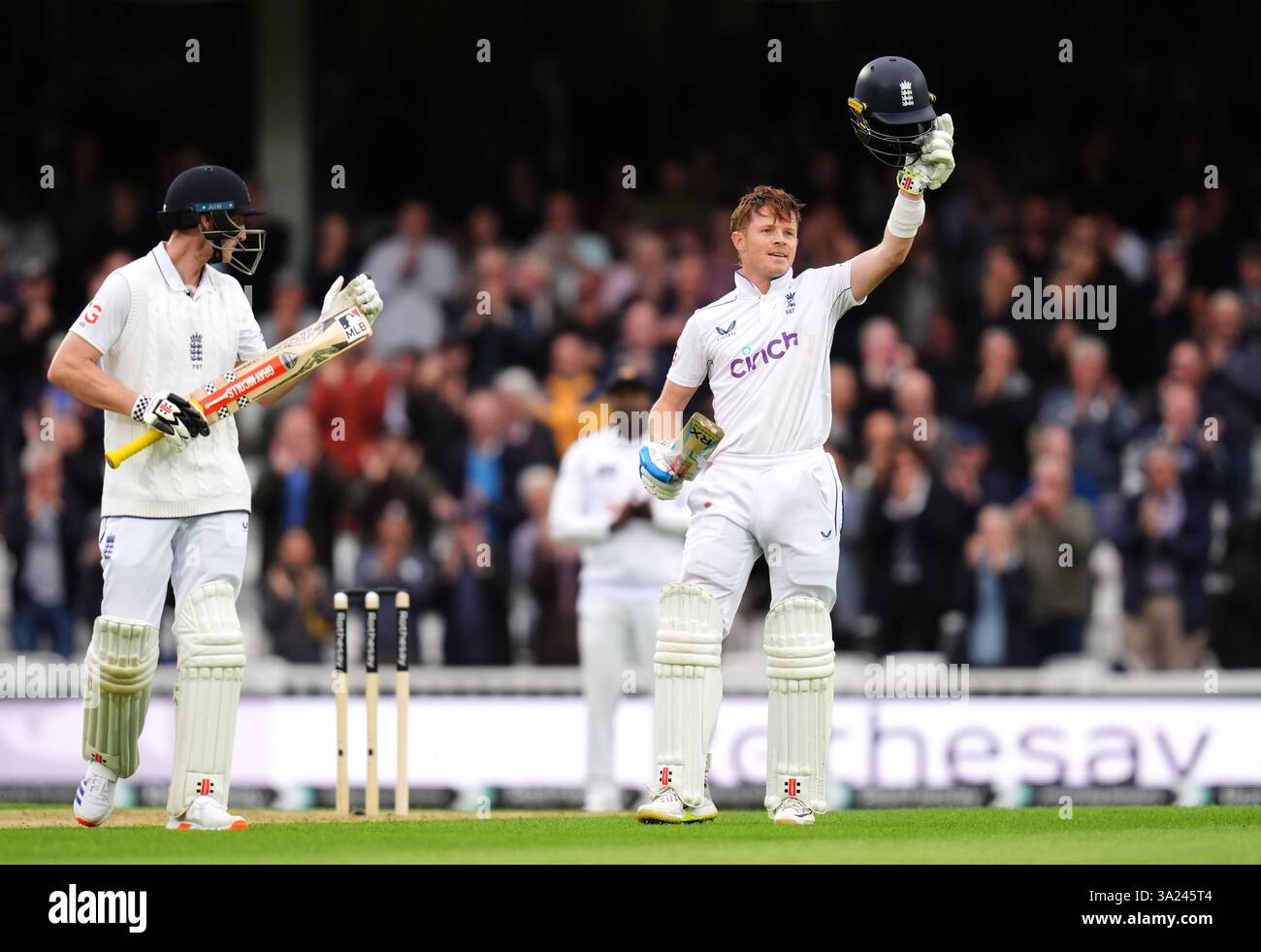 England's Ollie Pope celebrates reaching his century, as team-mate ...