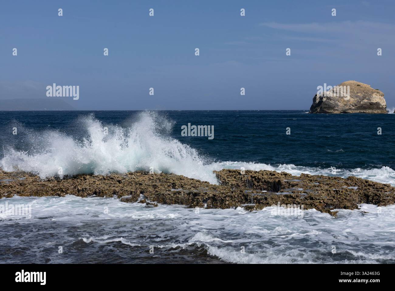 Waves breaking on rocks in Guadeloupe, Caribbean Stock Photo - Alamy
