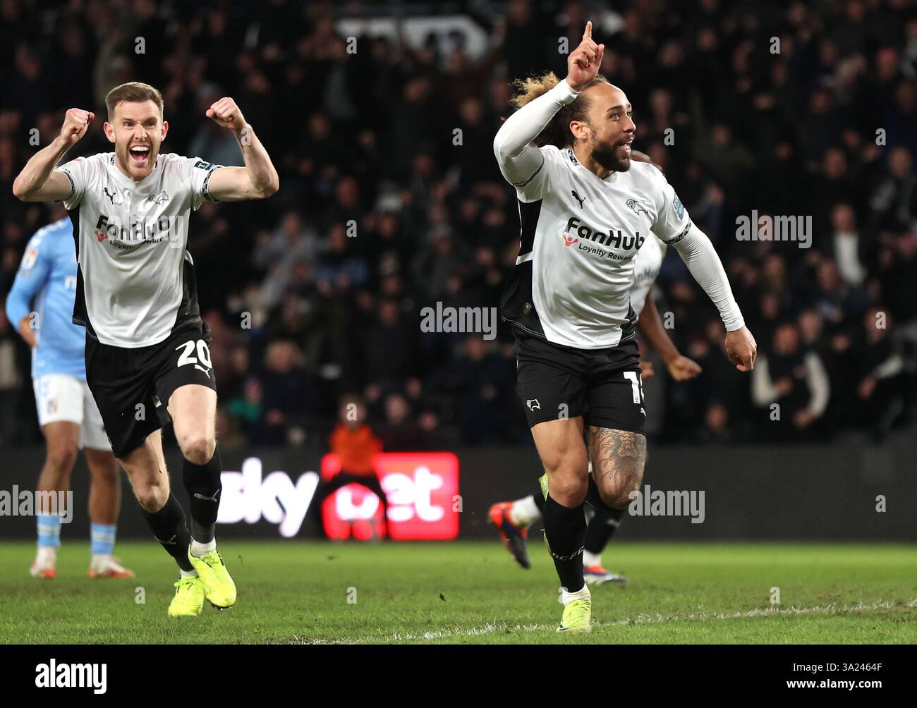 Derby County's Marcus Harness (right) celebrates scoring their side's ...