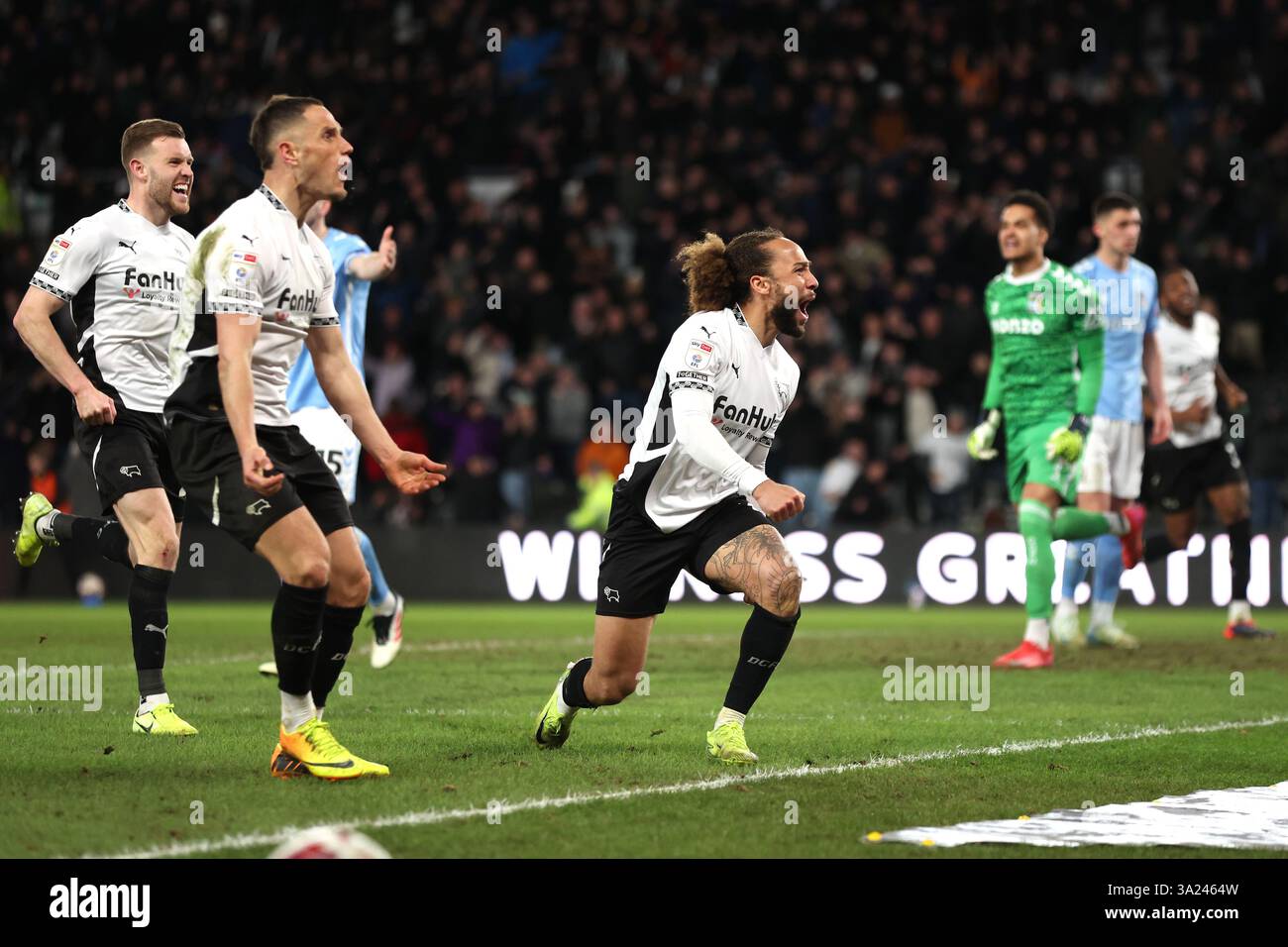 Derby County's Marcus Harness (centre) celebrates scoring their side's ...