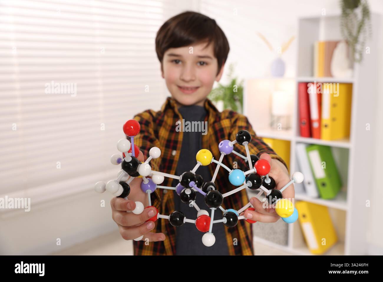 Boy with DNA structure model indoors, selective focus Stock Photo - Alamy