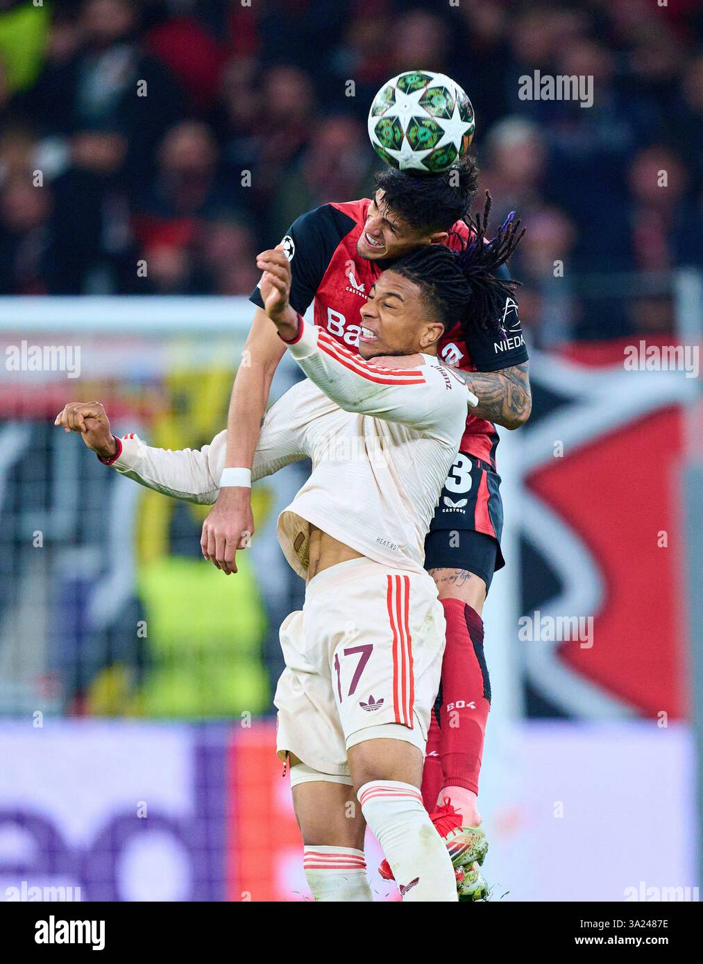 Leverkusen, Germany. 11th Mar, 2025. Michael Olise (FCB 17) compete for the ball, tackling, duel ...