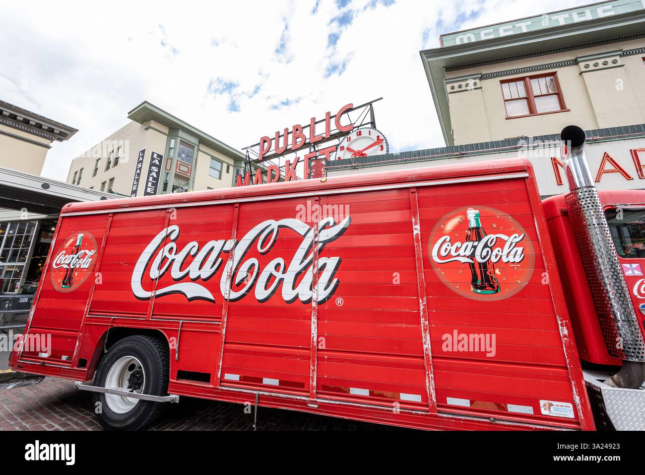 A Coca-Cola truck is parked at Pike Place Market in Seattle, WA. The ...
