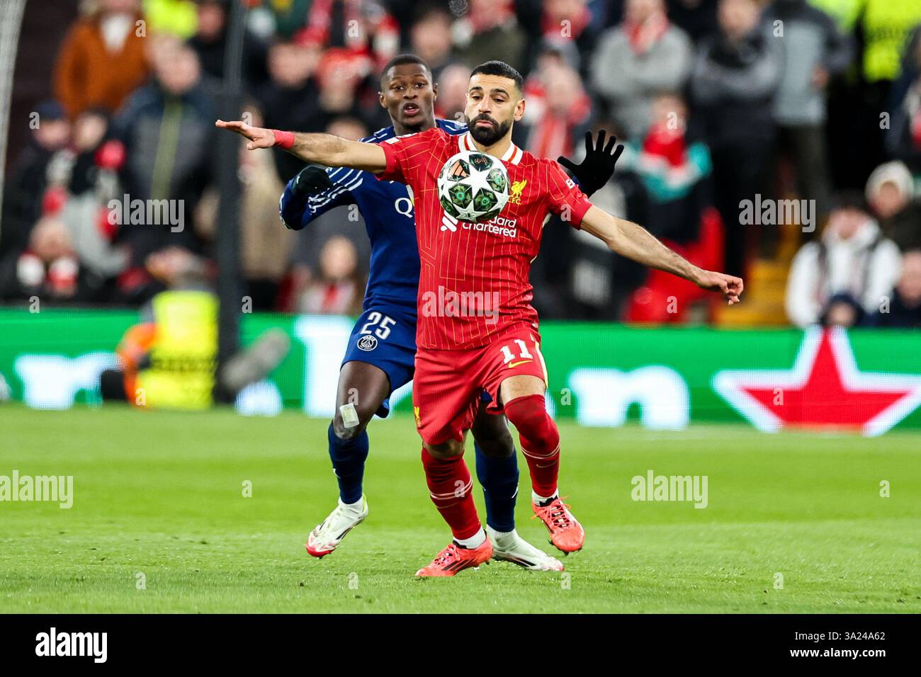 Mohamed Salah of Liverpool is put under pressure by Nuno Mendes of ...