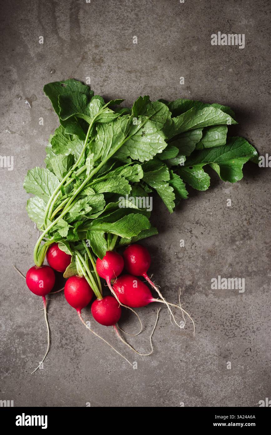 Bunch of red radish with leaves, top view Stock Photo - Alamy
