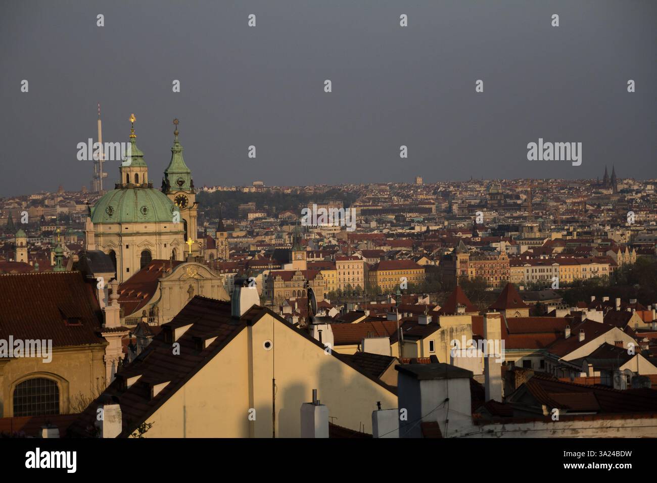 A stunning panoramic view of Prague, showcasing the city’s iconic rooftops, historic ...