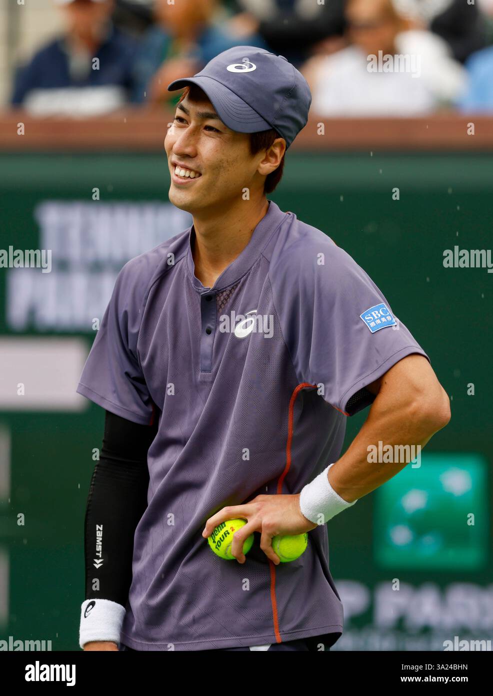 March 11, 2025 Yosuke Watanuki (JPN) reacts play being suspended due to rain against Tallon ...