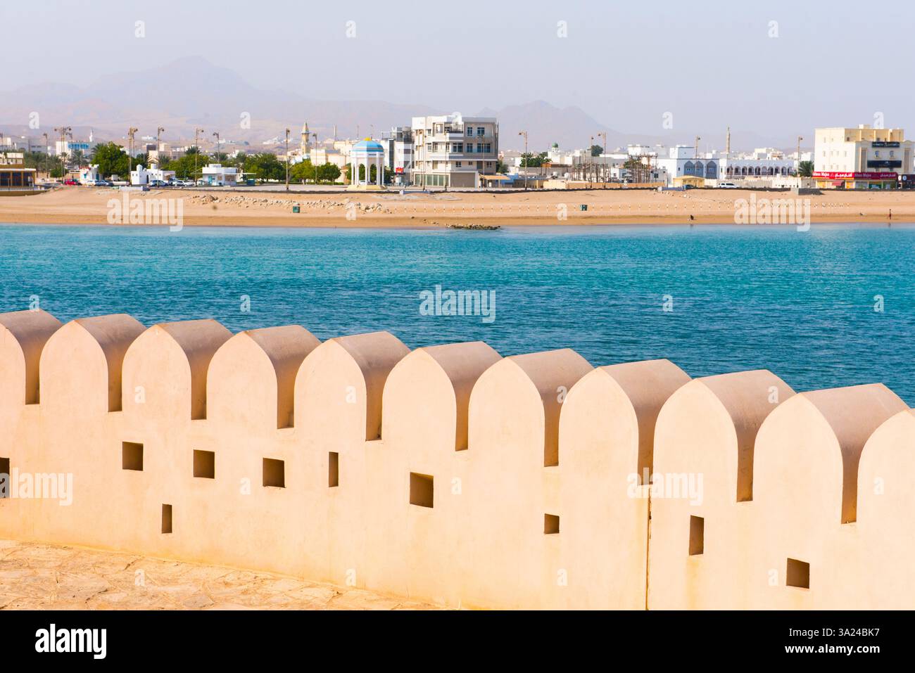 Crenelated wall protecting the lighthouse at Al Ayjah village, Sur ...